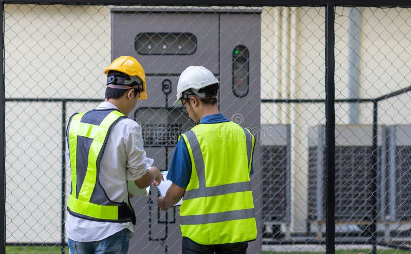 Electrical Engineer Working in Control Room. Electrical Engineer Man ...