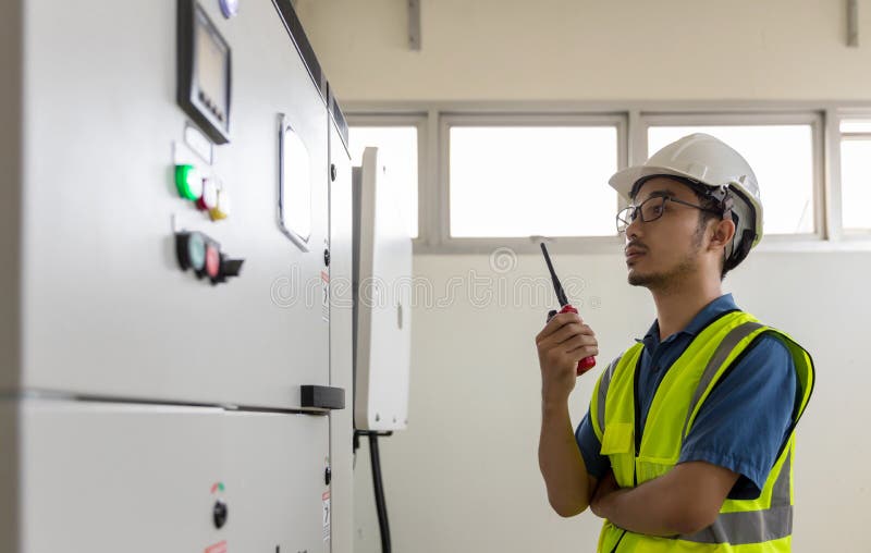 Electrical Engineer Working in Control Room. Electrical Engineer Man ...