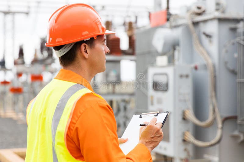 Electrical Engineer Writing Clipboard Stock Image - Image of industry ...