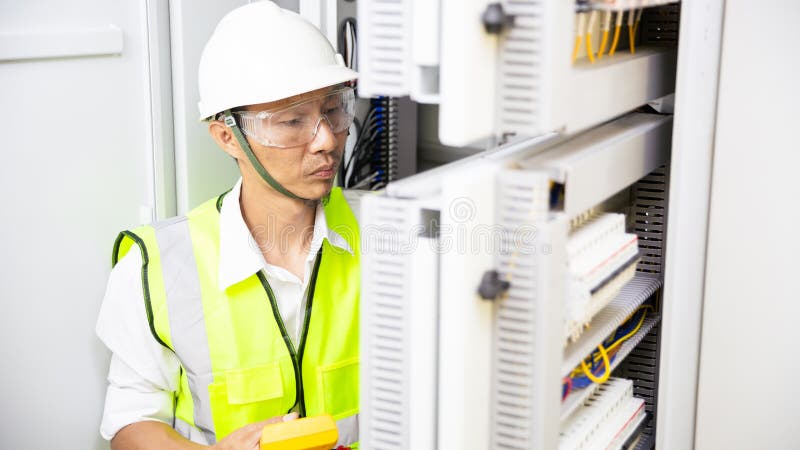 Electrical engineering man stock photo. Image of breaker - 247864572