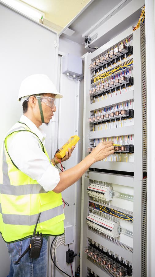 Electrical engineering man stock image. Image of installation - 248422733
