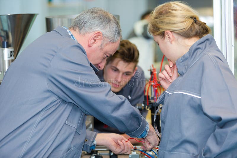 Electrical Engineers Assembling Electrical Parts Stock Photo - Image of screwdriver, electrical ...