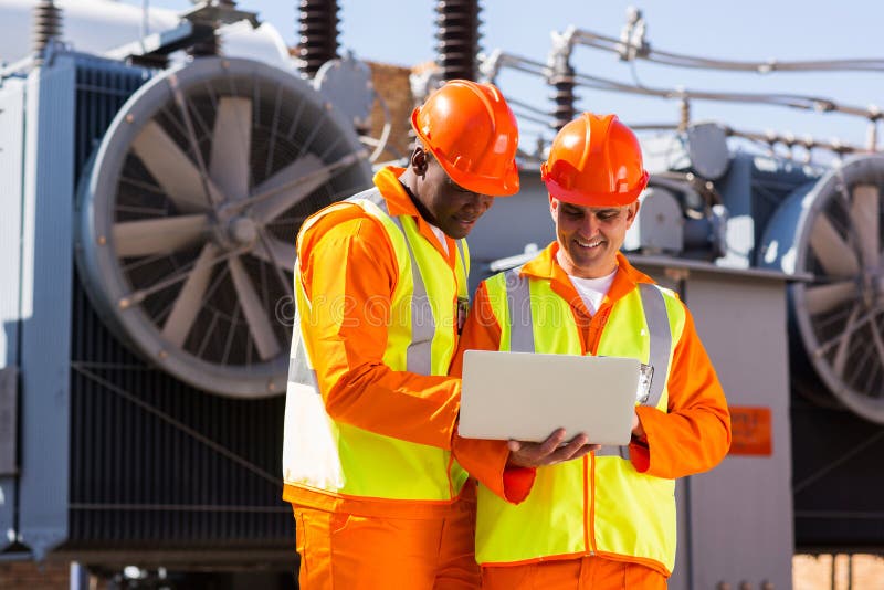Electrical Engineers Computer Stock Image - Image of afro, electrician ...