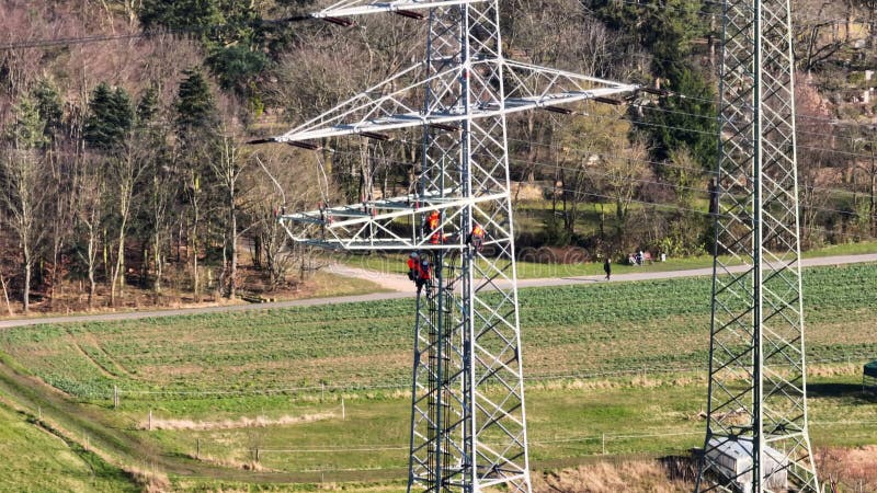 Electrical Engineers Working on Electricity Pylon Stock Video - Video ...