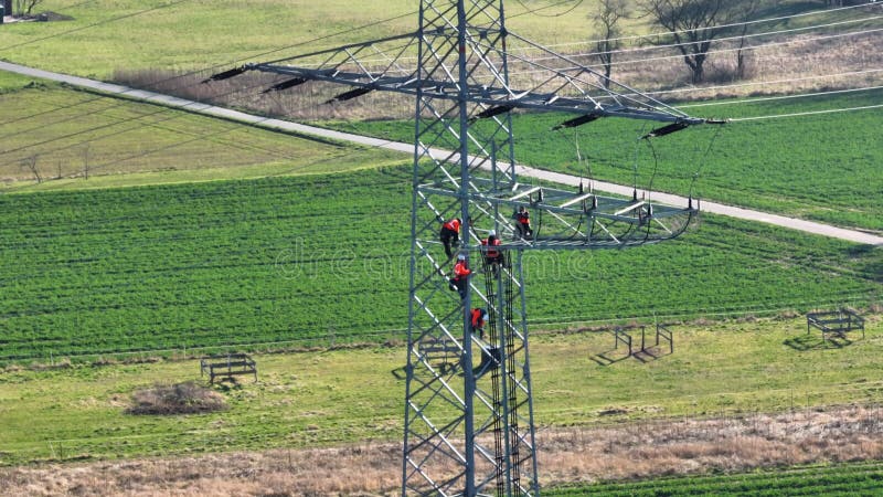 Electrical Engineers Working on Electricity Pylon Stock Video - Video ...
