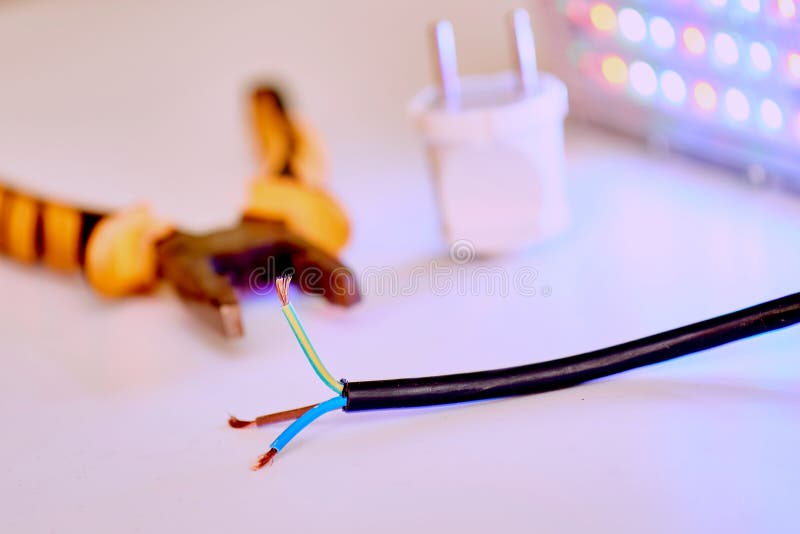 Black Three-core Electric Cable, Metalwork Pliers and LED Lamp Stock ...