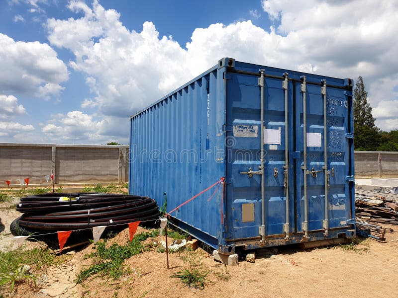 The Electrical Equipment Storage Container and HDPE Pipes Stock Photo ...