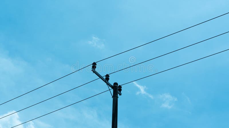 Electrical Infrastructure Network in the Form of Concrete Poles and 3 High Voltage Electric ...