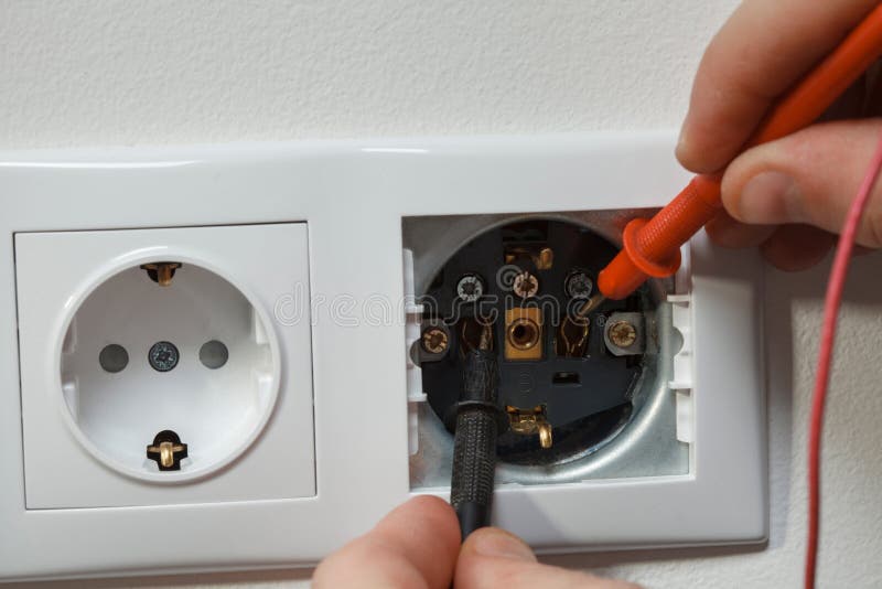 Metering Socket Voltage with Digital Multimeter Stock Photo - Image of ...