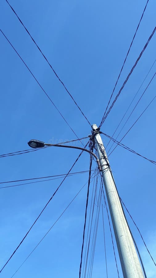 Electrical Installation Poles with Strands of Cables Extending To ...