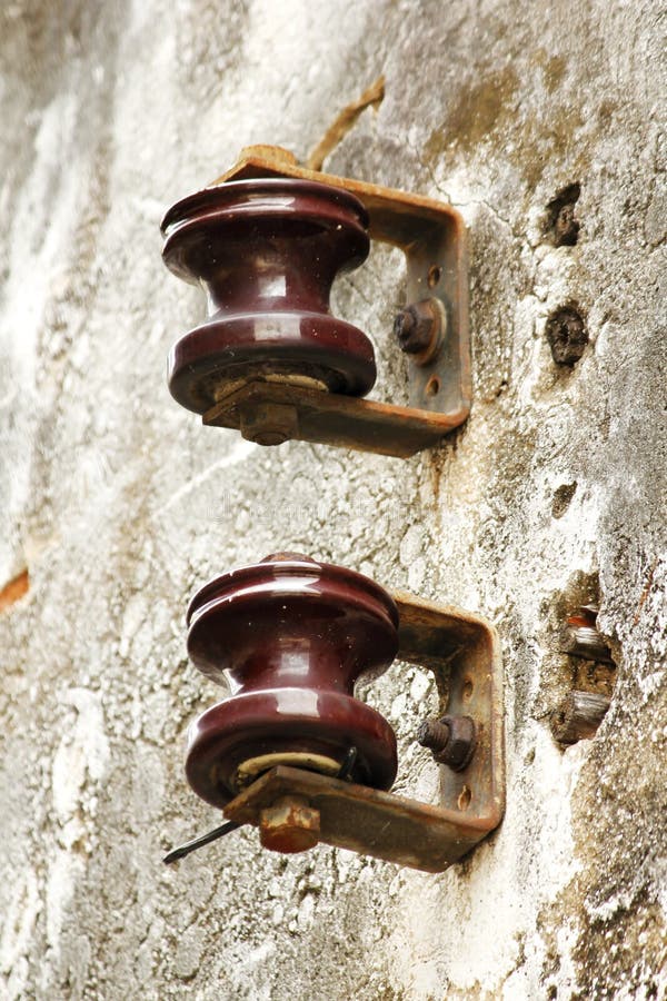 Electrical Insulator Old Rust on the Wall Stock Image - Image of ...