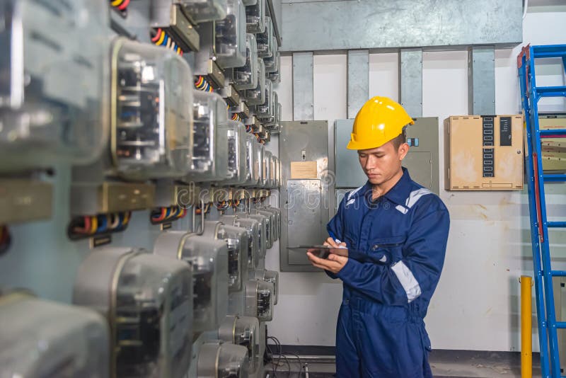 Electrical Maintenance Engineer is Checking .Electricity Meter, Main ...