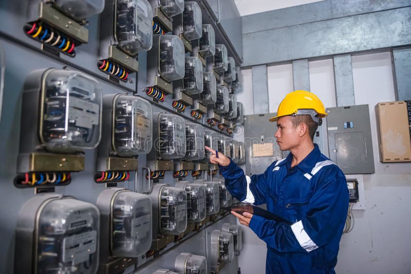 Electrical Maintenance Engineer is Checking .Electricity Meter, Main ...