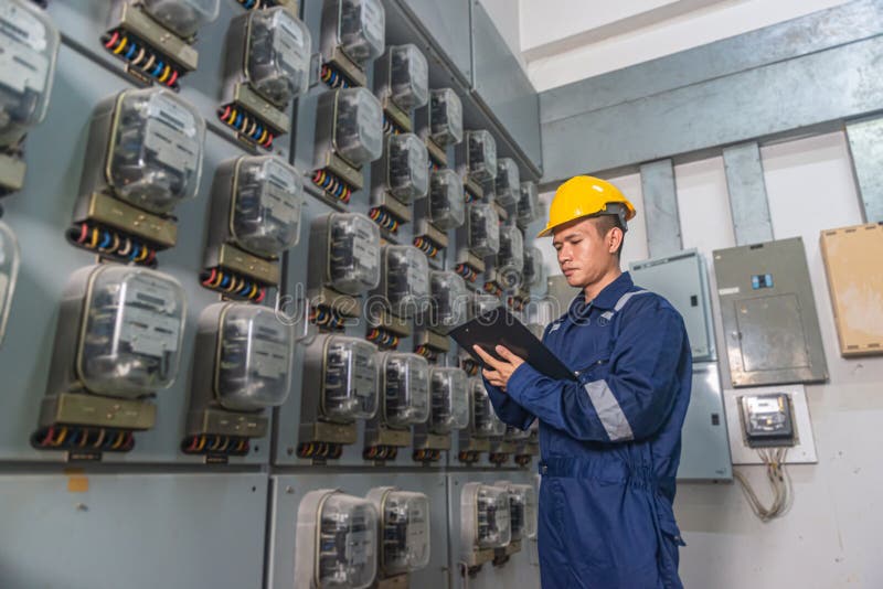 Electrical Maintenance Engineer is Checking .Electricity Meter, Main ...