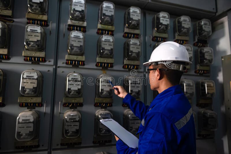 Electrical Maintenance Engineer is Checking .Electricity Meter, Main ...