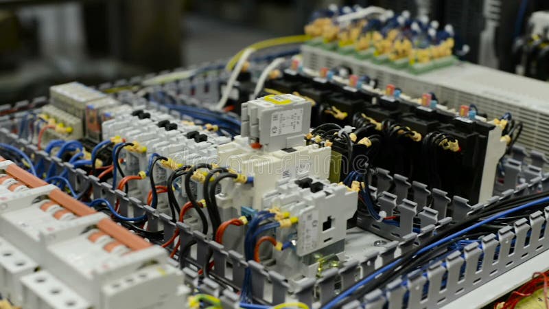 Electrical Modules, Switches, Relays and Cables are Mounted on the ...