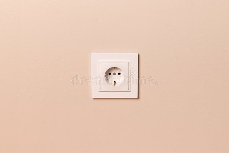 Electrical Outlet on Beige Wall Stock Image - Image of electrical ...