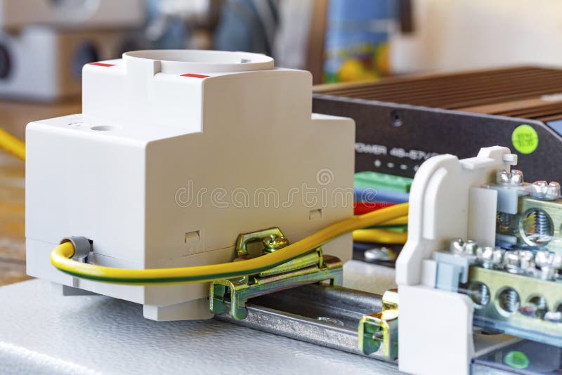 Electrical Outlet with Power Plug Installed on the DIN Rail Stock Image ...