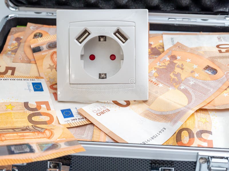 The Electrical Outlet is in a Suitcase with Money. Stock Photo - Image ...