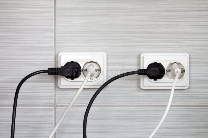 Electrical Outlets with Cables Plugged Stock Photo - Image of domestic ...