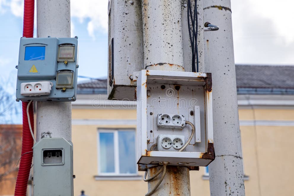 Electrical Outlets for Current on a Pole in the Open Air Stock Photo ...