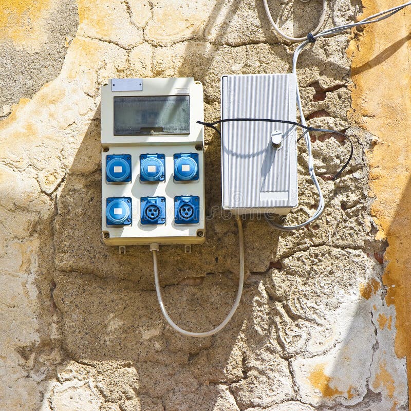 Electrical Panel Hanging from a Damaged Plaster Wall Stock Photo ...