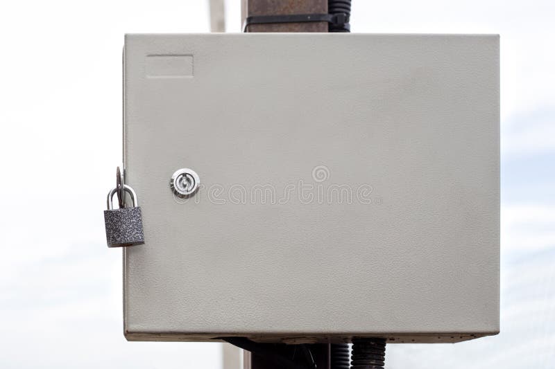 An Electrical Panel in an Iron Box, Locked and Hanging on a Pole. Input ...