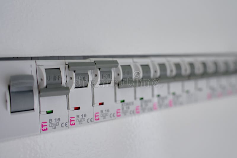 Electrical Panel with Row of Circuit Breakers in Fuse Box Stock Image ...