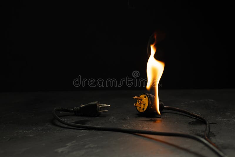 An Electrical Plug Fire is Caused by a Short Circuit of Electrical Current. Concept of ...