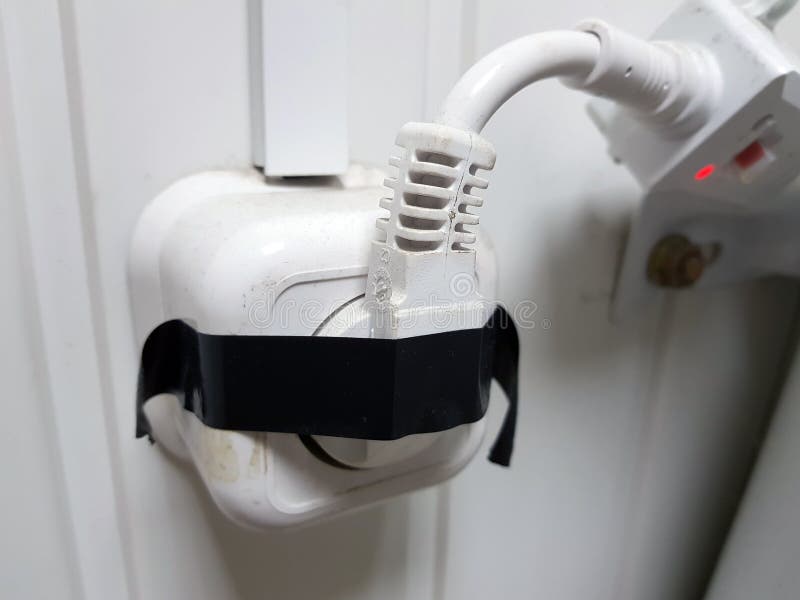 Electrical Plug in Electrical Outlet Stock Photo - Image of wire ...