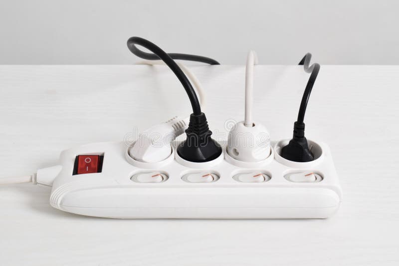 Electrical Plug in Outlet Socket at Home Isolated on White Background ...