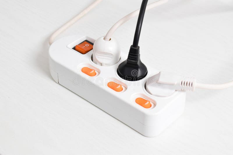 Electrical Plug in Outlet Socket at Home Isolated on White Background ...