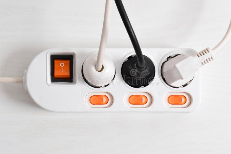 Electrical Plug in Outlet Socket at Home Isolated on White Background ...