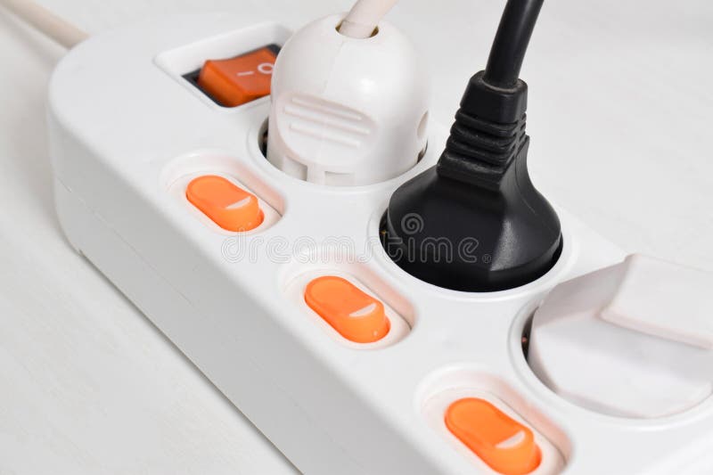 Electrical Plug in Outlet Socket at Home Isolated on White Background ...