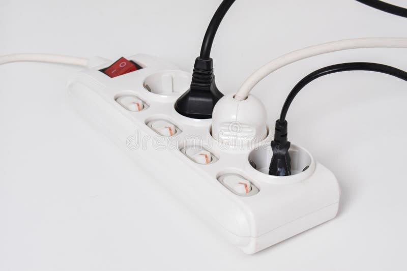 Electrical Plug in Outlet Socket at Home Isolated on White Background ...