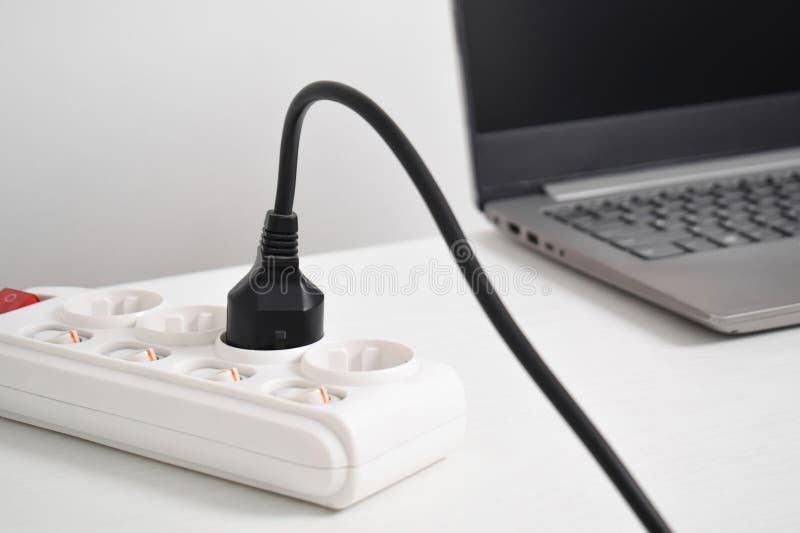 Electrical Plug in Outlet Socket at Home. Electric Plug, Power Cable ...