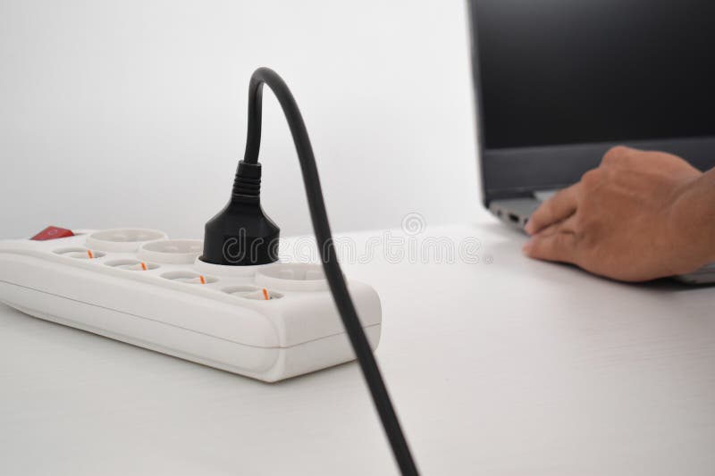 Electrical Plug in Outlet Socket at Home. Electric Plug, Power Cable ...