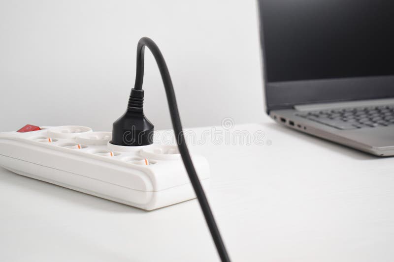 Electrical Plug in Outlet Socket at Home. Electric Plug, Power Cable ...