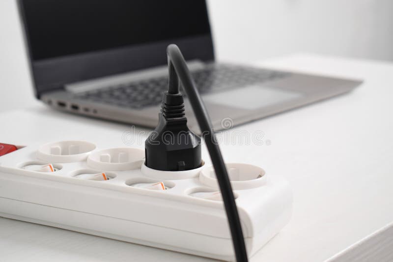 Electrical Plug in Outlet Socket at Home. Electric Plug, Power Cable ...