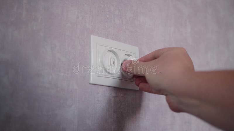 Electrical Plug in the Socket To Protect Children from Electric Shock ...