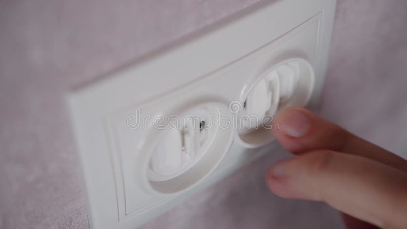 Electrical Plug in the Socket To Protect Children from Electric Shock ...