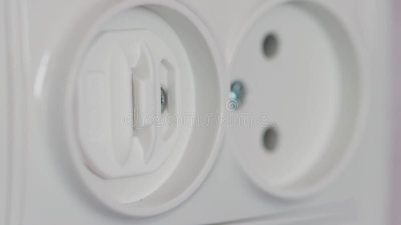 Electrical Plug in the Socket To Protect Children from Electric Shock ...