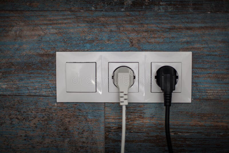 Electrical Plug on a Wooden Wall Stock Image - Image of modern ...