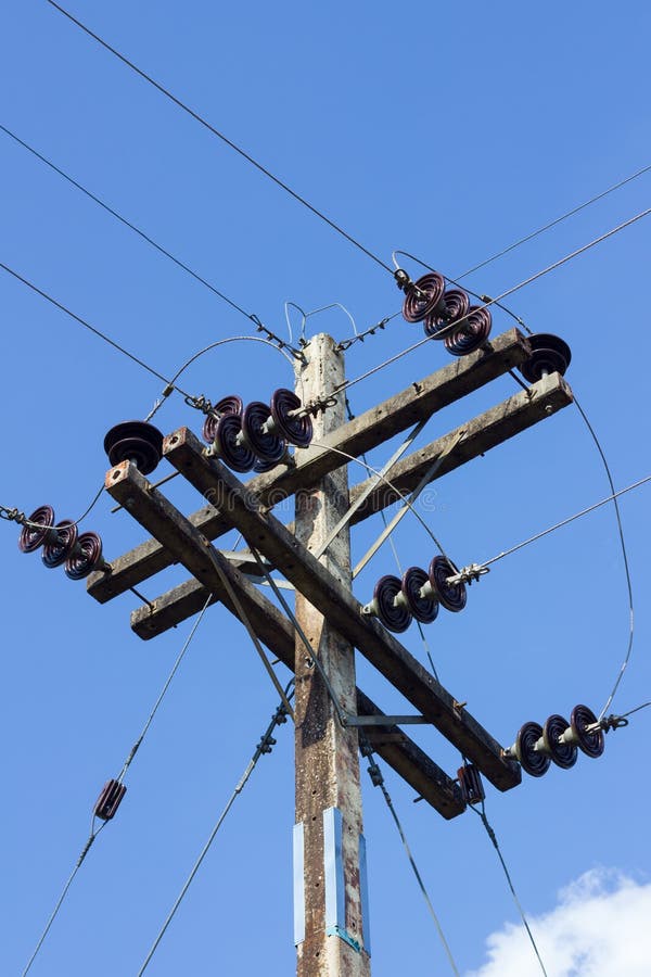 Electrical Post by the Road with Power Line Cables, Against Blue Stock ...
