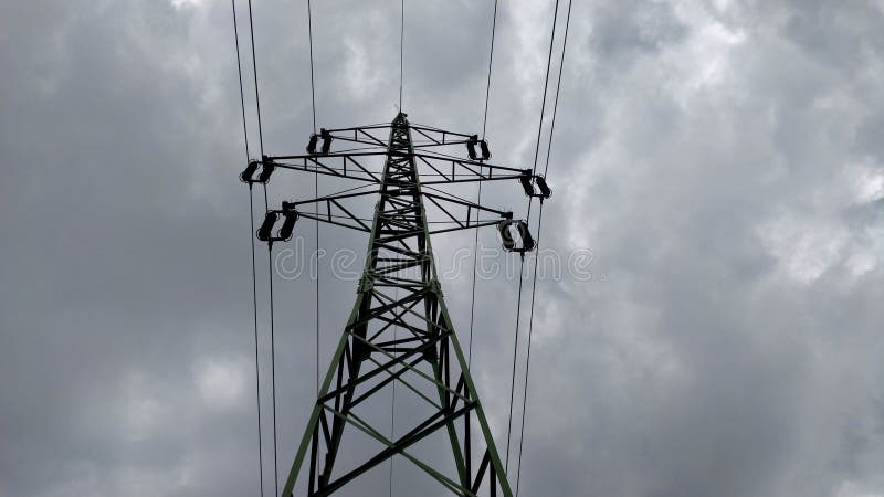 Electrical Power Grid Pole Seeing from the Bottom Up To the Gray Cloudy ...