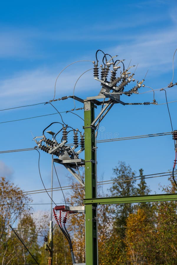 Electrical Power Lines and Insulators Against Blue Sky.. Stock Image ...
