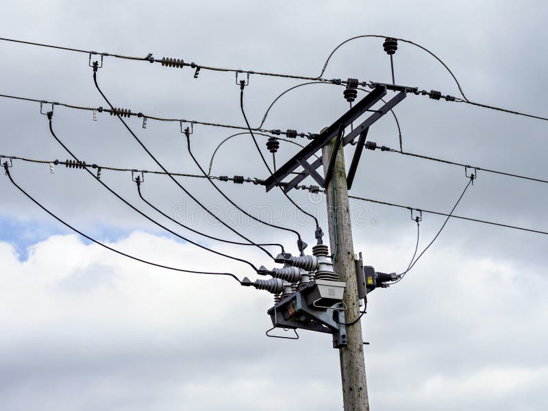 Electrical Power Lines and Transformers on a Wooden Utility Pole ...