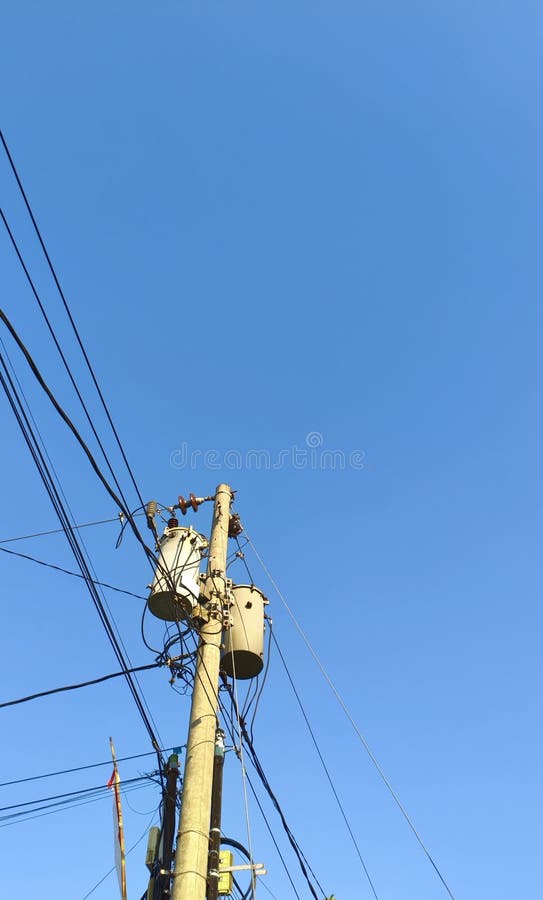 Electrical Power Pole with Transformers Against Blue Sky Stock Image ...