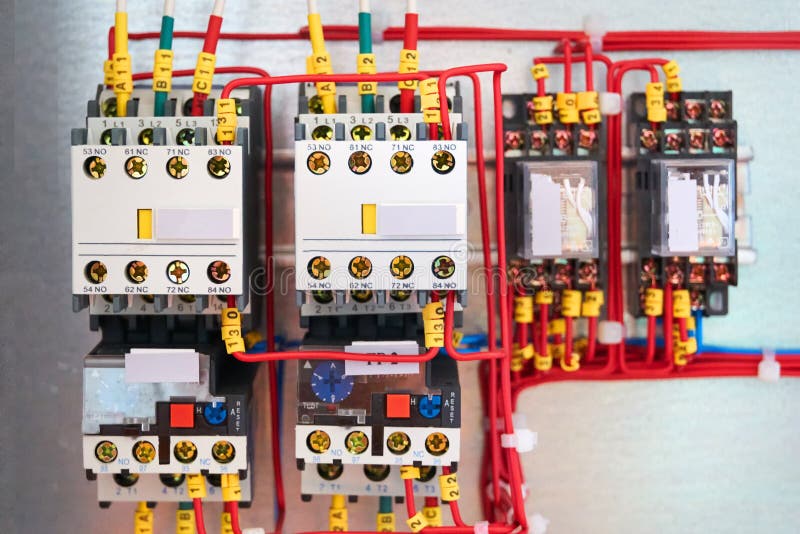 Electrical Relays with Connected Wires. Industrial Background Stock ...