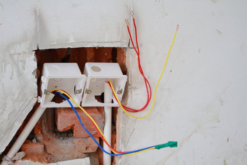 Electrical renovation work stock image. Image of hand - 100626819